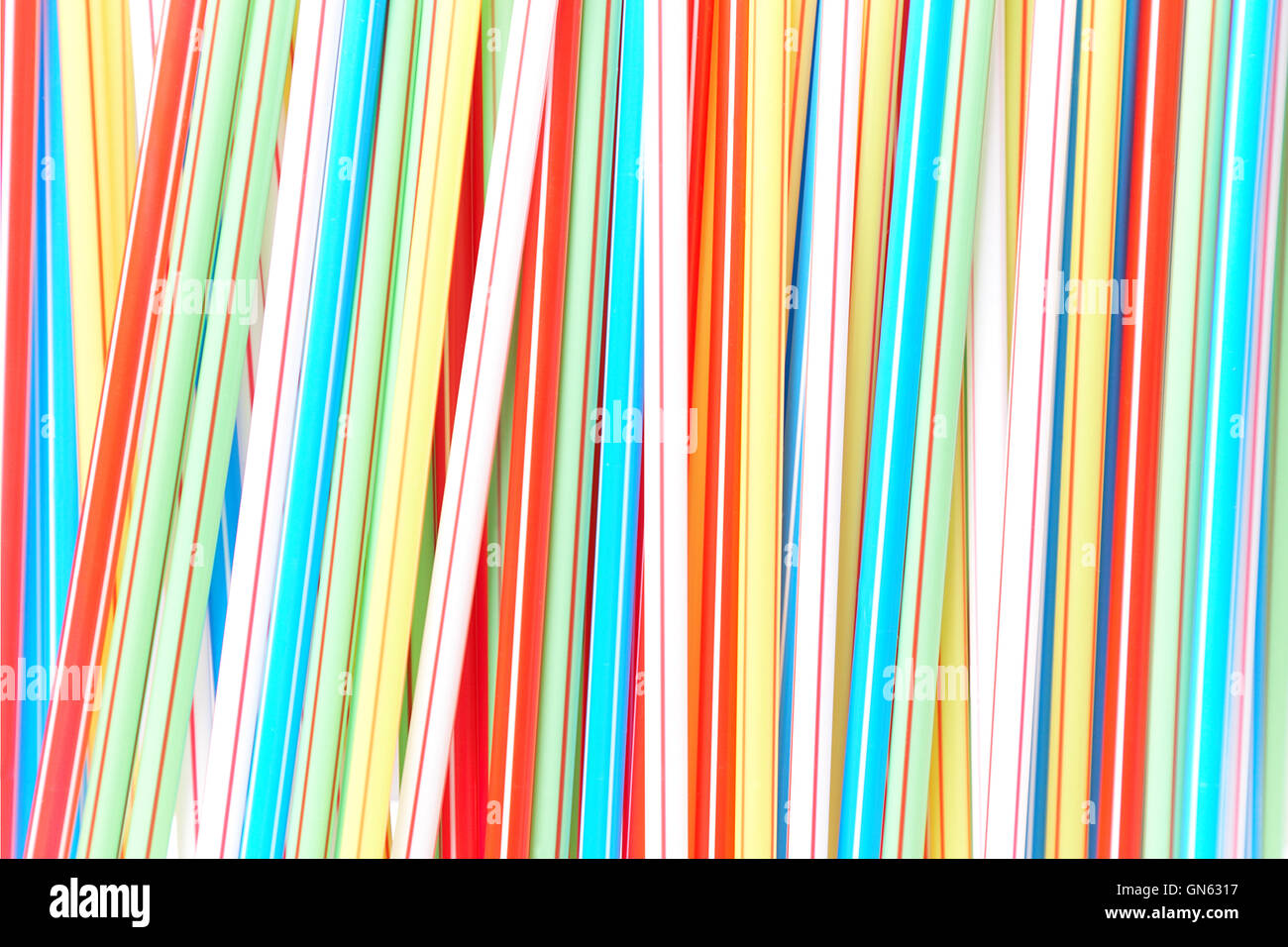 color straws as a background Stock Photo - Alamy