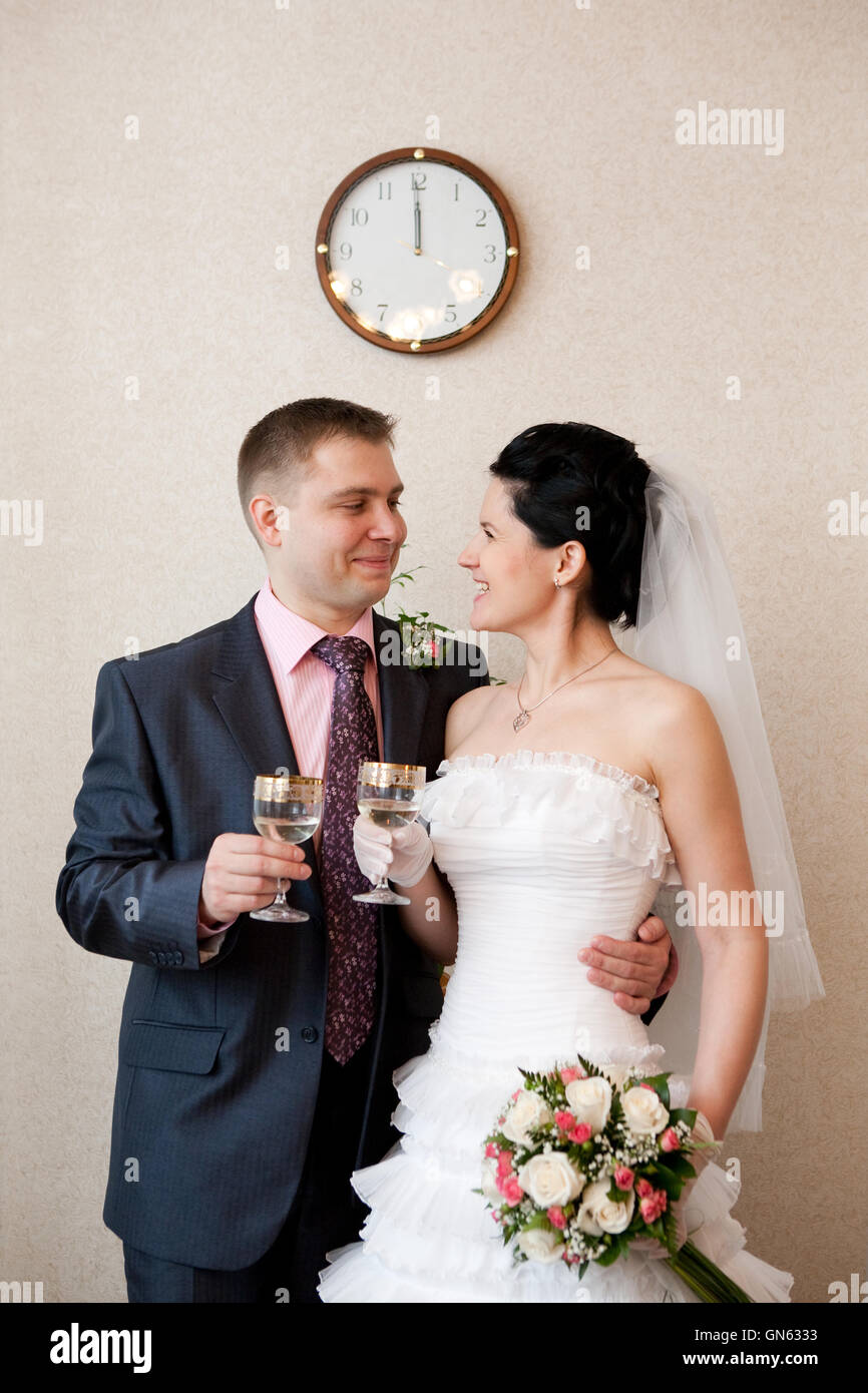 couple under the clock Stock Photo - Alamy