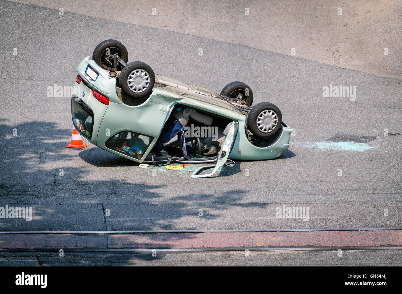 Terrific car accident with car destroyed and overturned Stock Photo - Alamy