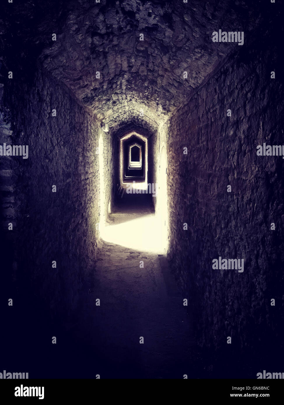 Creepy passage in a castle Stock Photo - Alamy