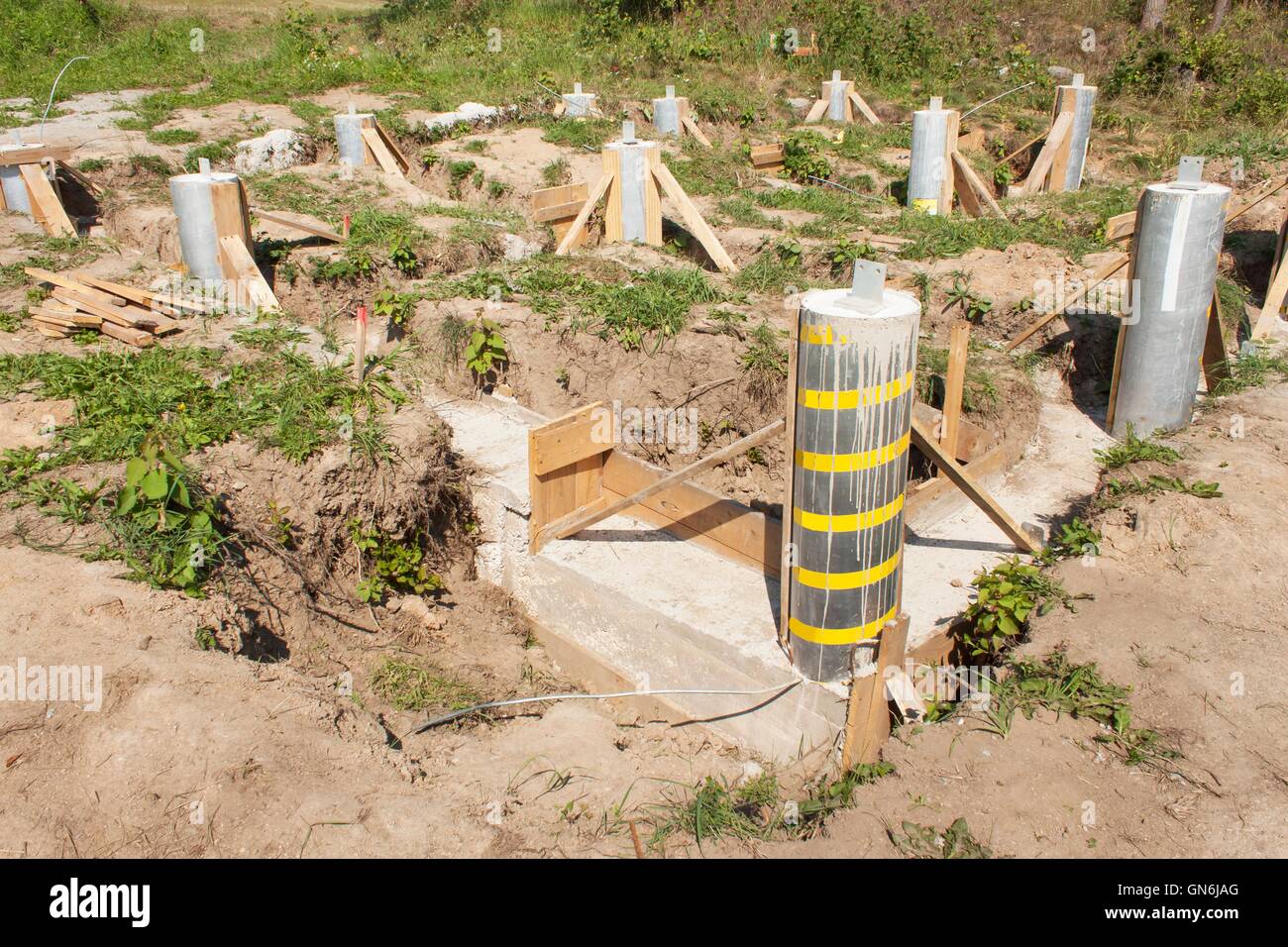 Concrete foundations of the house. Construction of a small family house ...