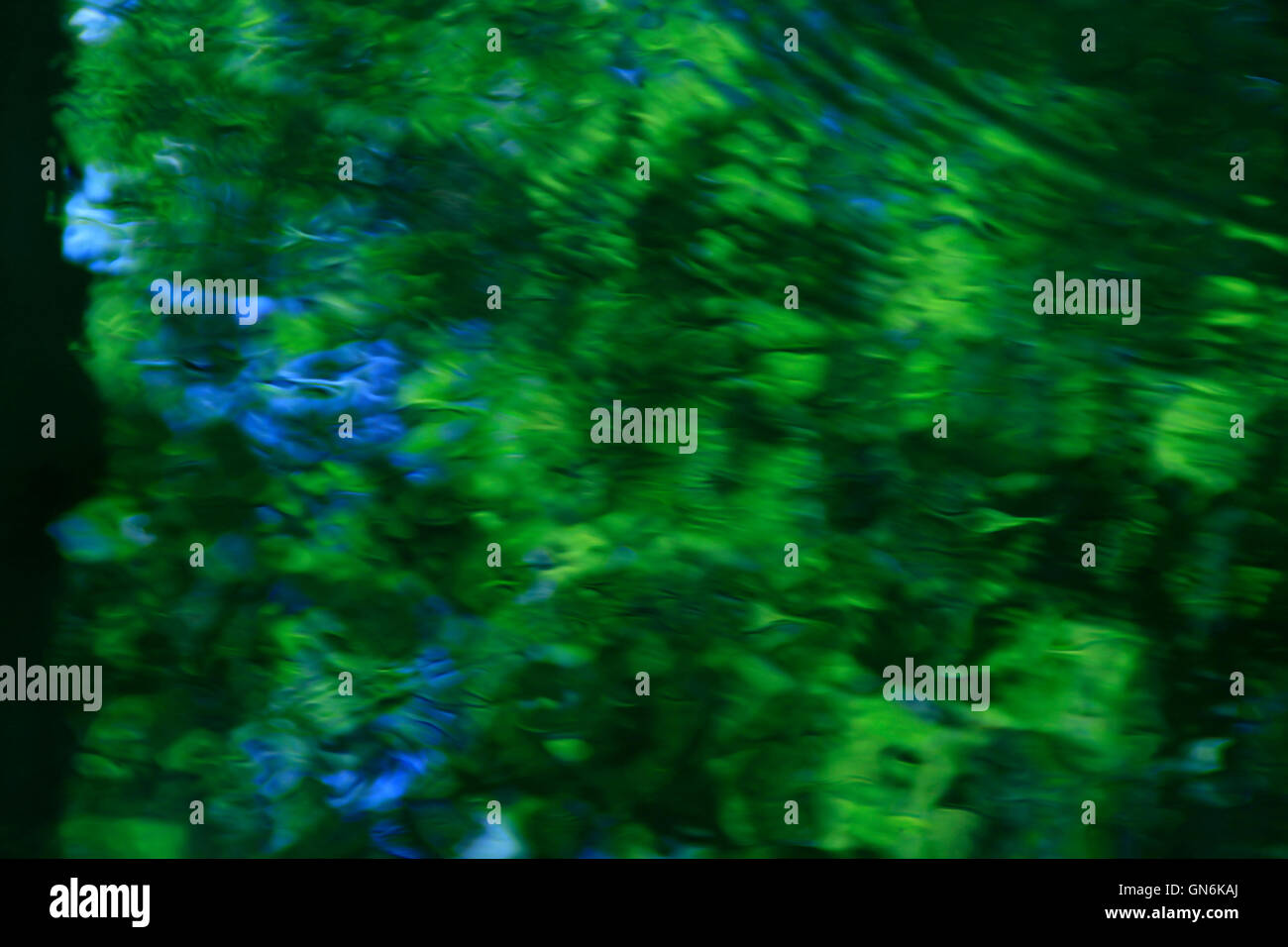 Abstract green wave reflection. Color Lights on Water Reflection Stock ...