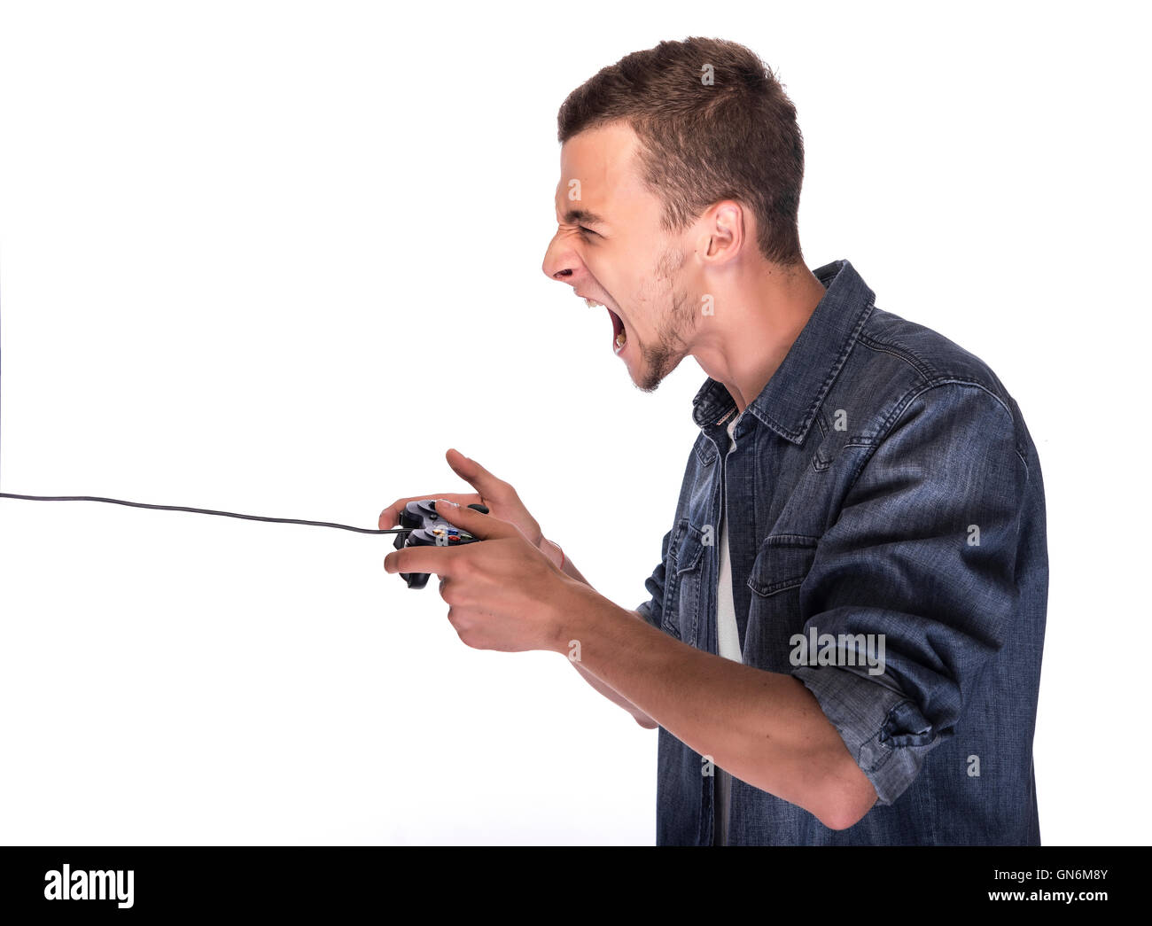 Playing a console Cut Out Stock Images & Pictures - Alamy