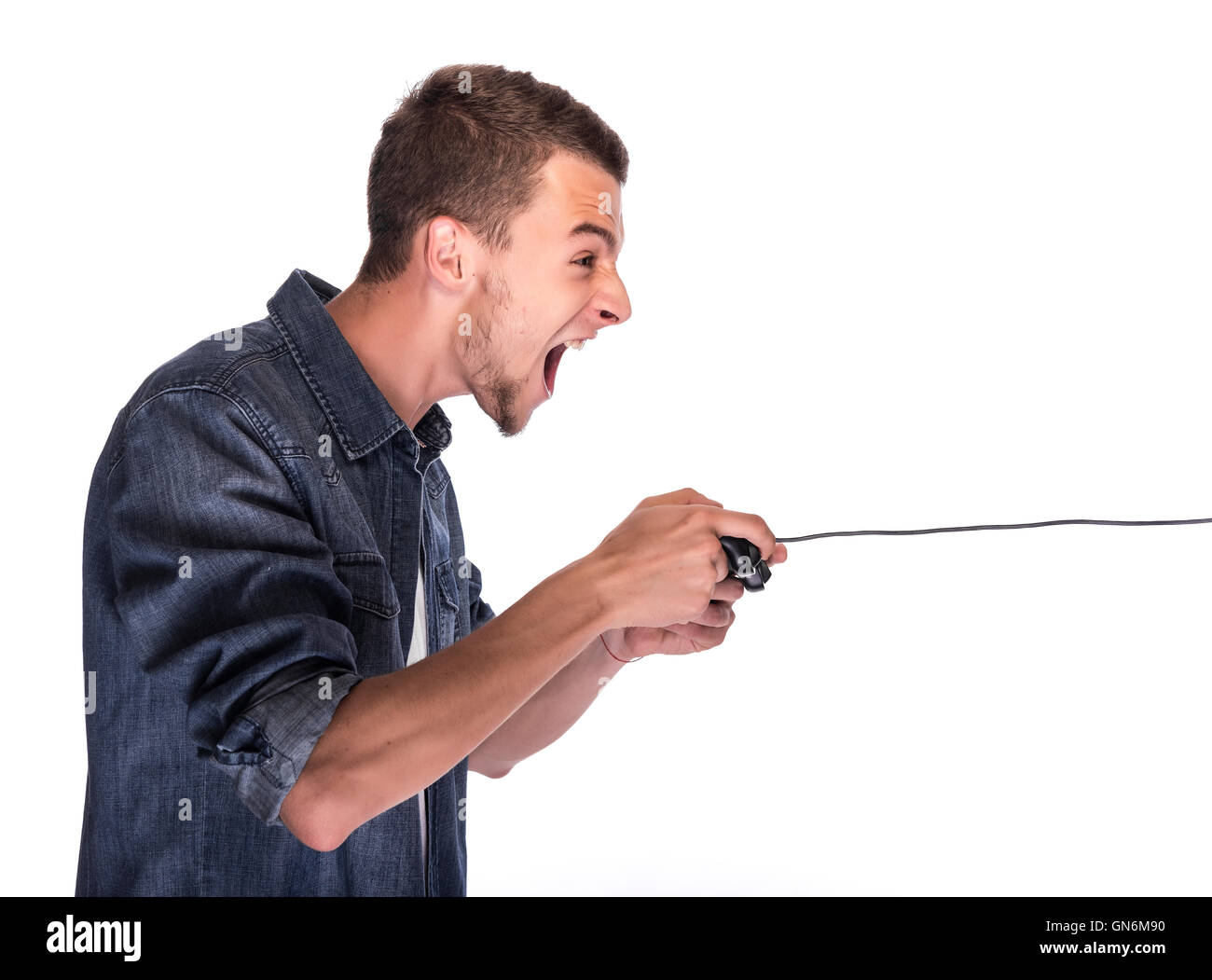 Man playing on joystick Cut Out Stock Images & Pictures - Alamy