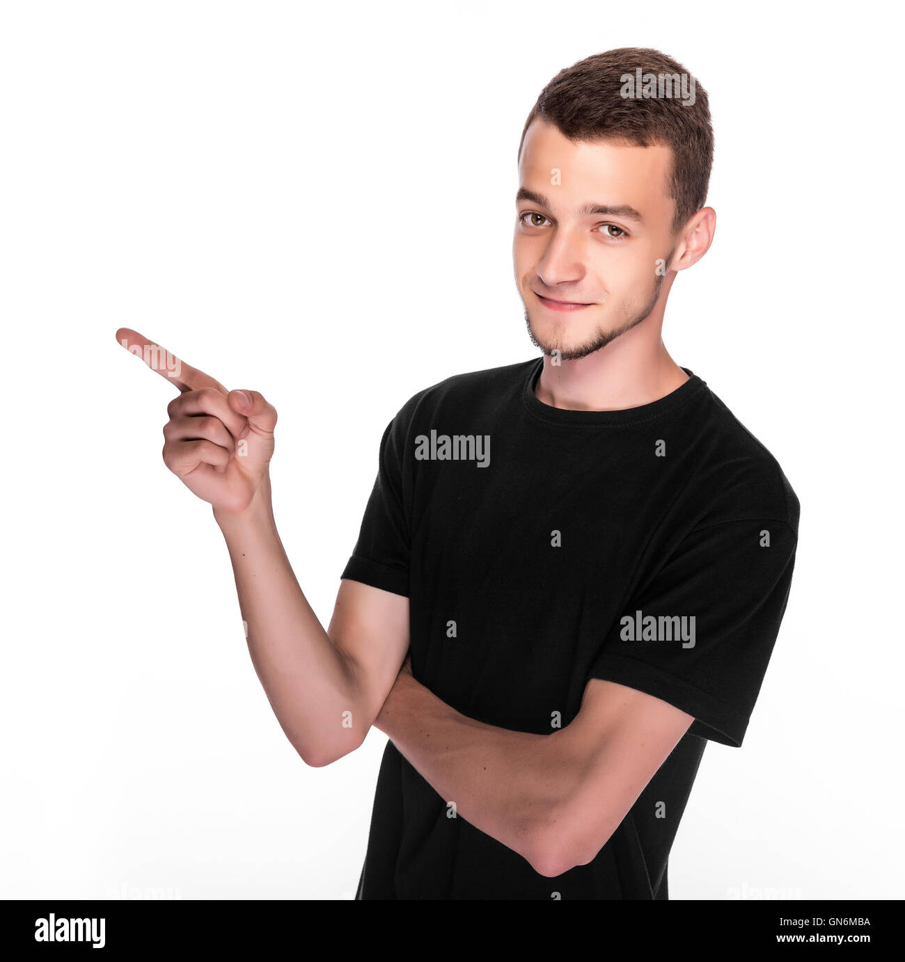 Man points to an empty space.. Isolated on white Stock Photo - Alamy