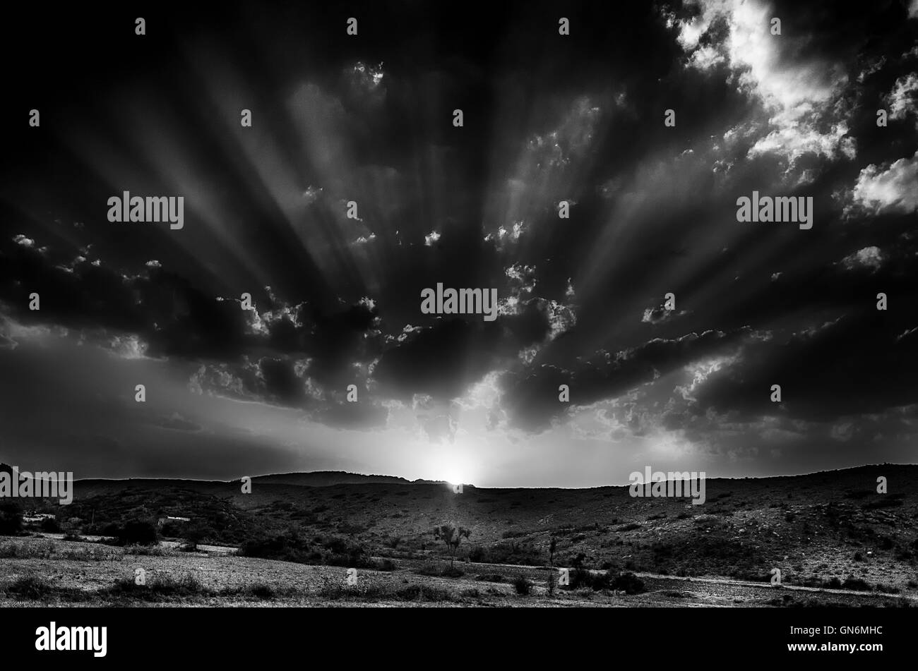 Sunset light and clouds Black and White Stock Photos & Images - Alamy