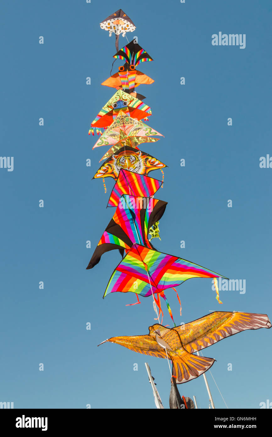 colored kites hanging in the air Stock Photo - Alamy