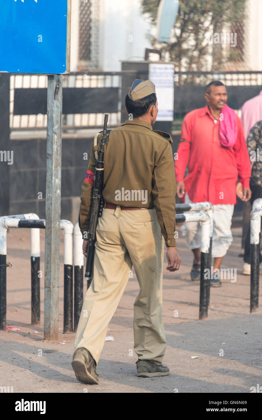 An armed security guard at Agra railway station in Agra, Uttar Pradesh ...