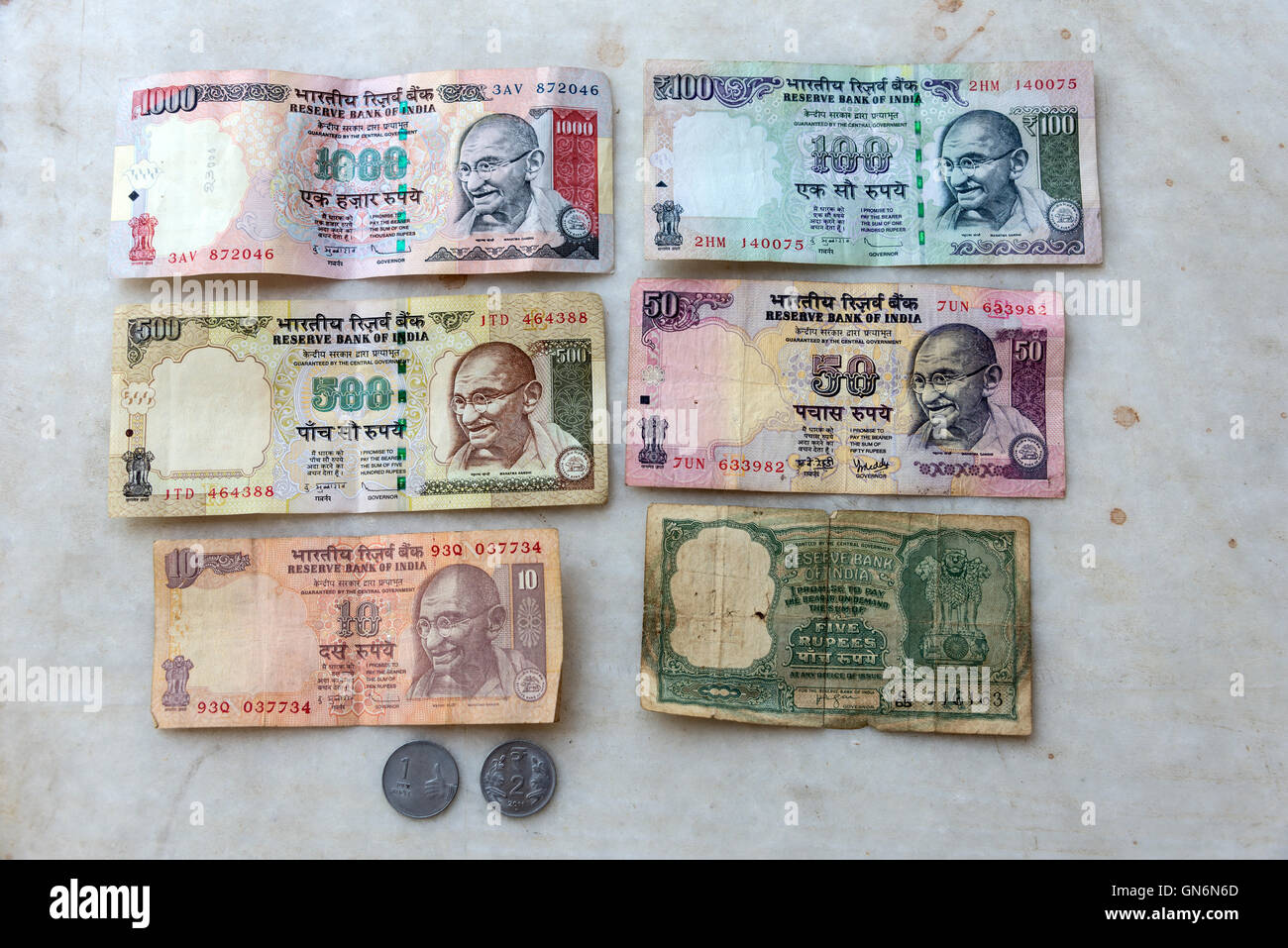 Indian currency of notes and coins Stock Photo - Alamy