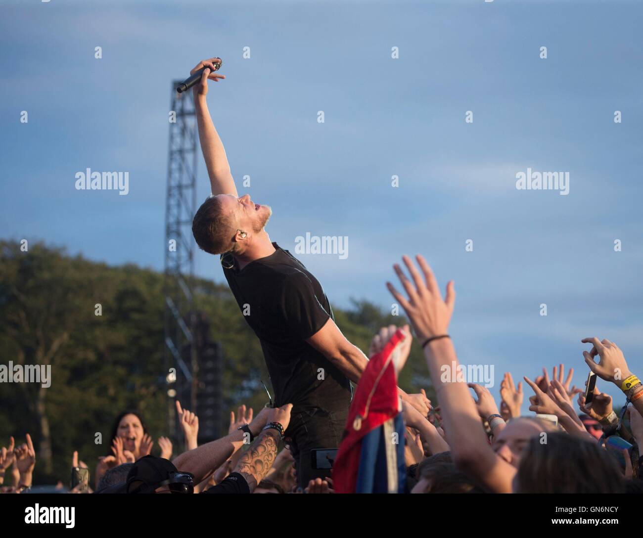 Imagine Dragons lead singer lead Dan Reynolds performs during the Leeds ...