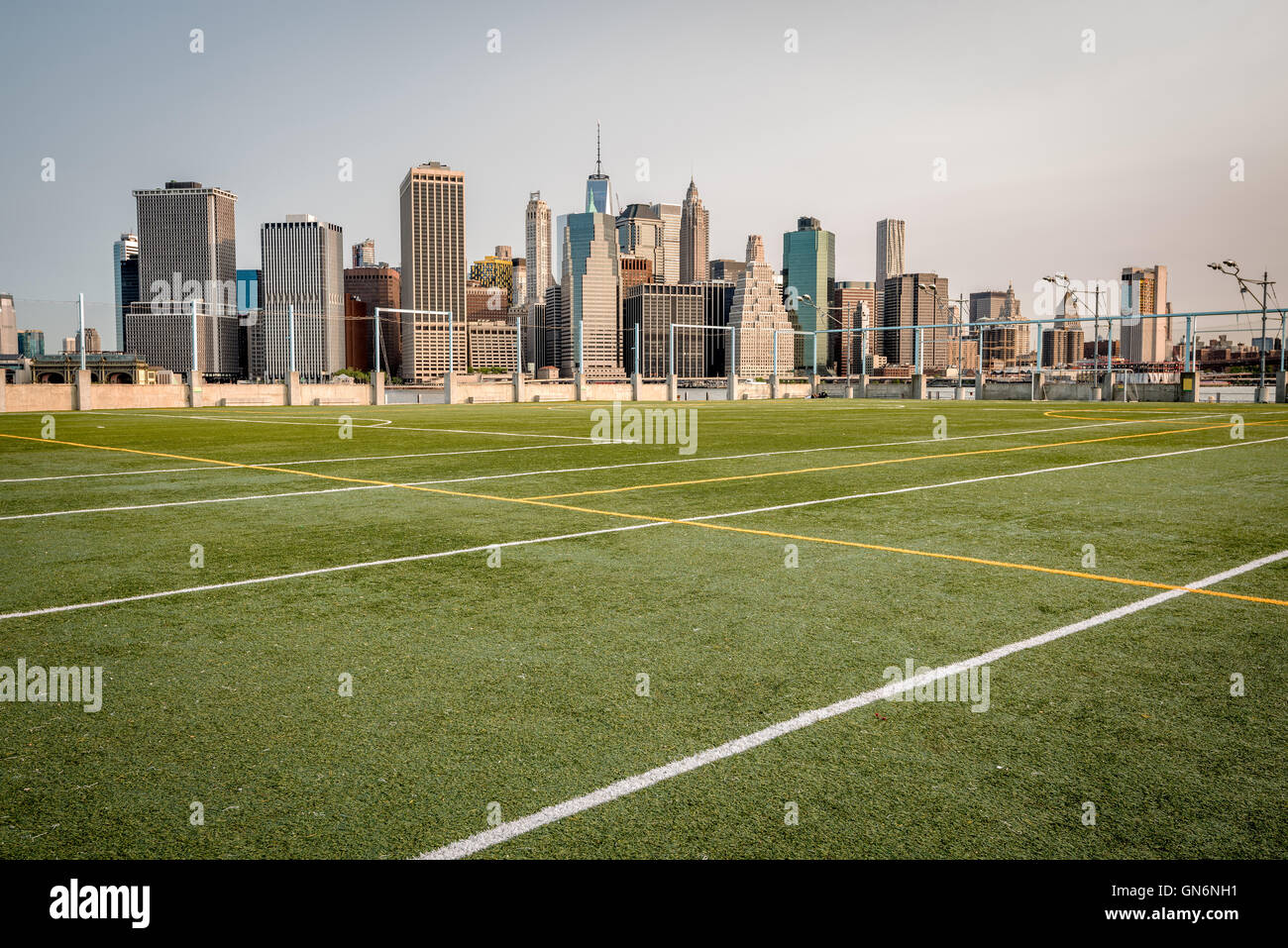 Soccer field and the New York skyline in the morning Stock Photo - Alamy