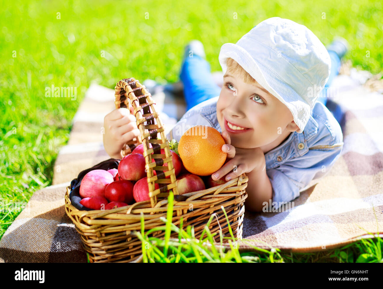 happy boy having a picnic in the summer park Stock Photo - Alamy