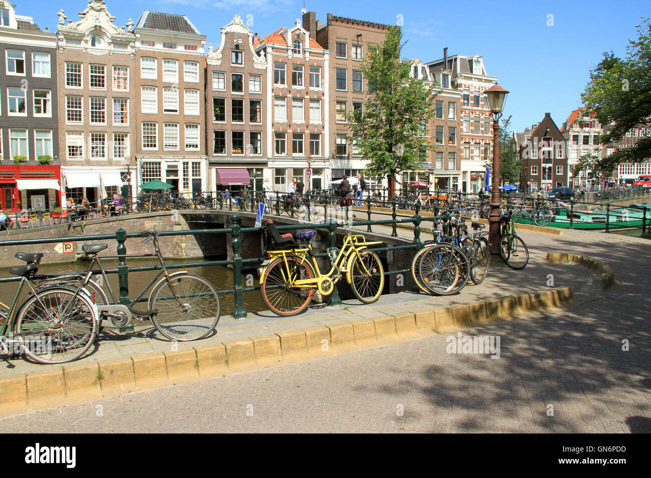 Yellow bike in Amsterdam Stock Photo - Alamy
