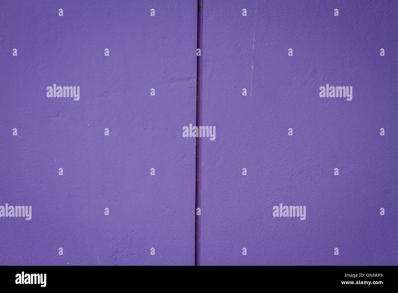 Concrete wall purple color Stock Photo - Alamy