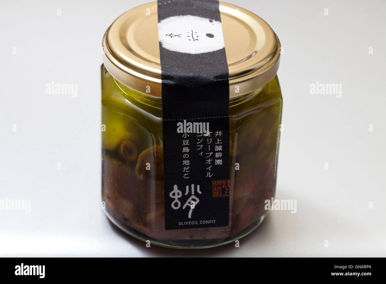 Japanese octopus confit in jar Stock Photo - Alamy