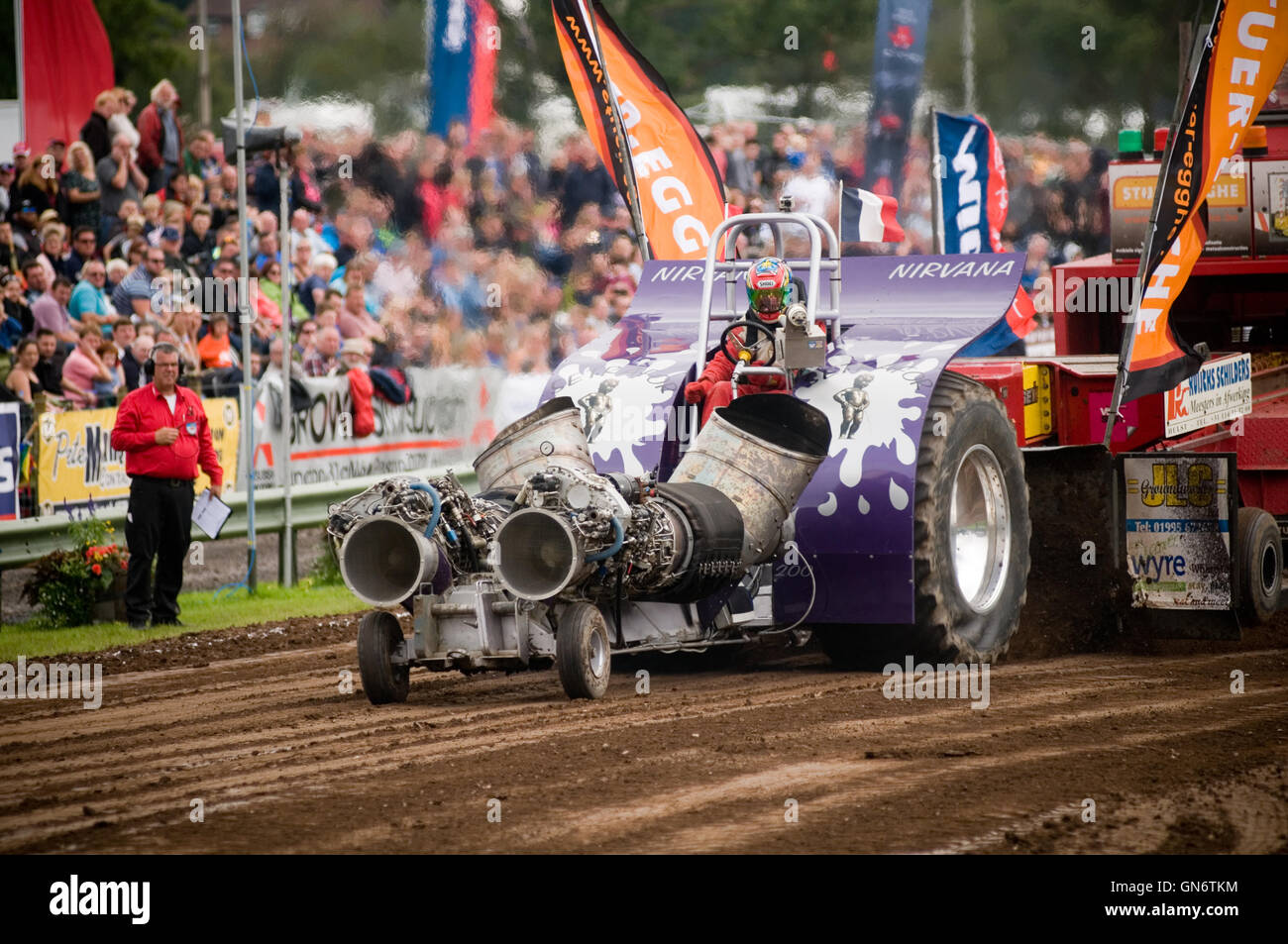 jet engined 2.5 ton modified tractor pulling a sled while competing in ...