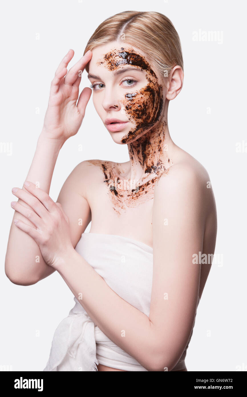 Peeling face with coffee scrub,Beautiful Young Woman Facial treatment ...