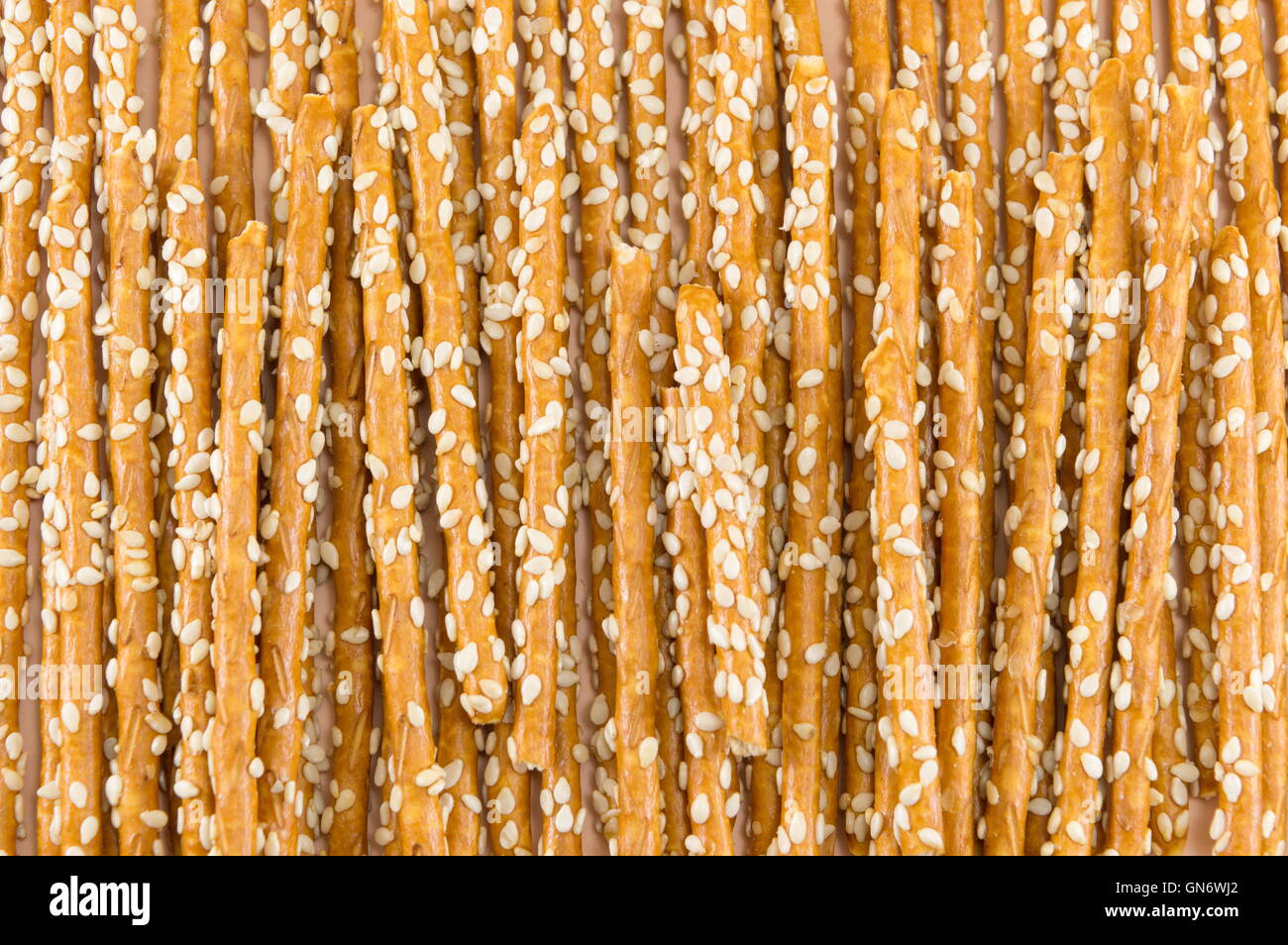Bunch of salty breadsticks snack background pattern Stock Photo - Alamy