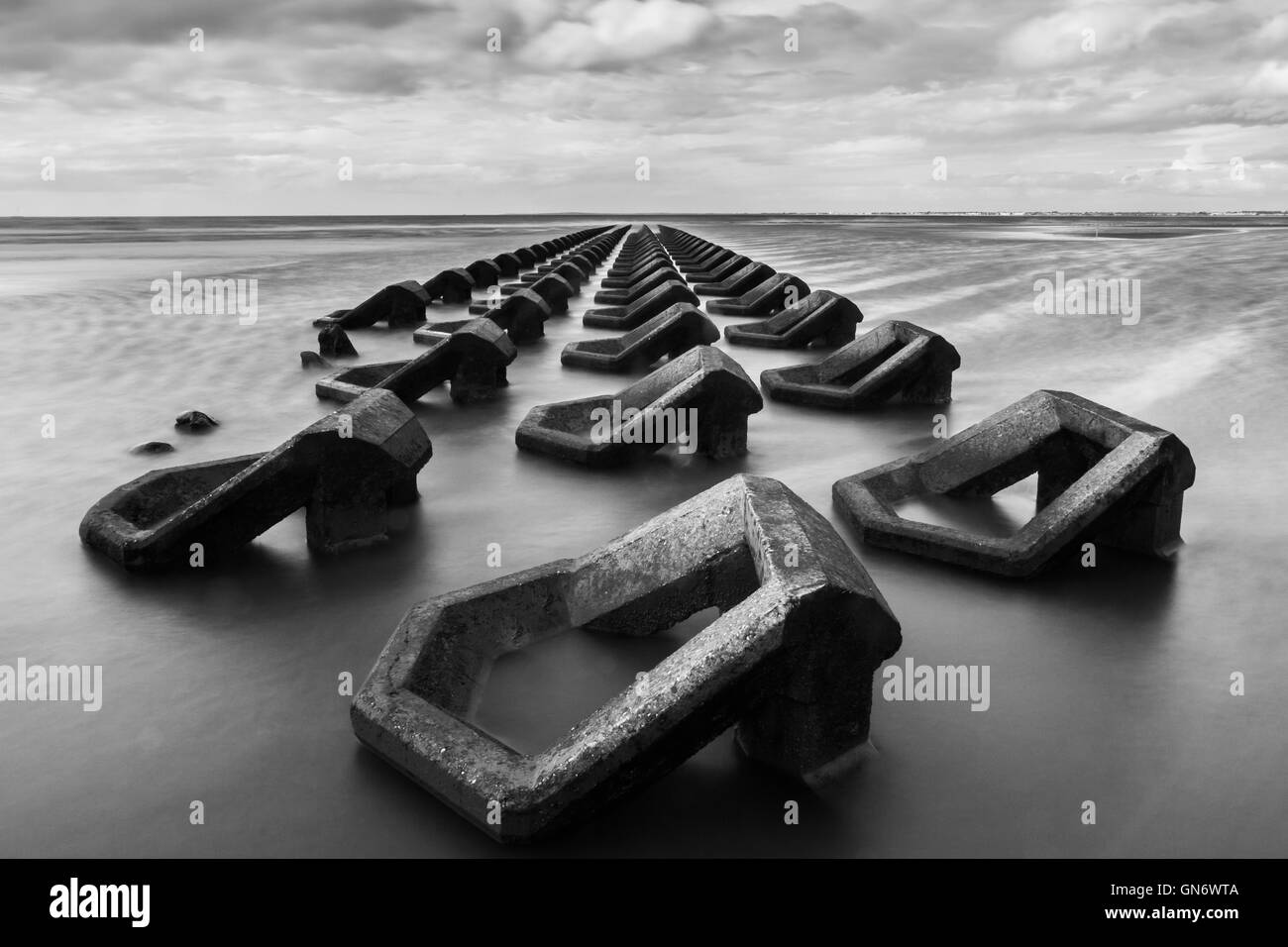Black and white sea defenses at New Brighton, Wirral, England Stock ...