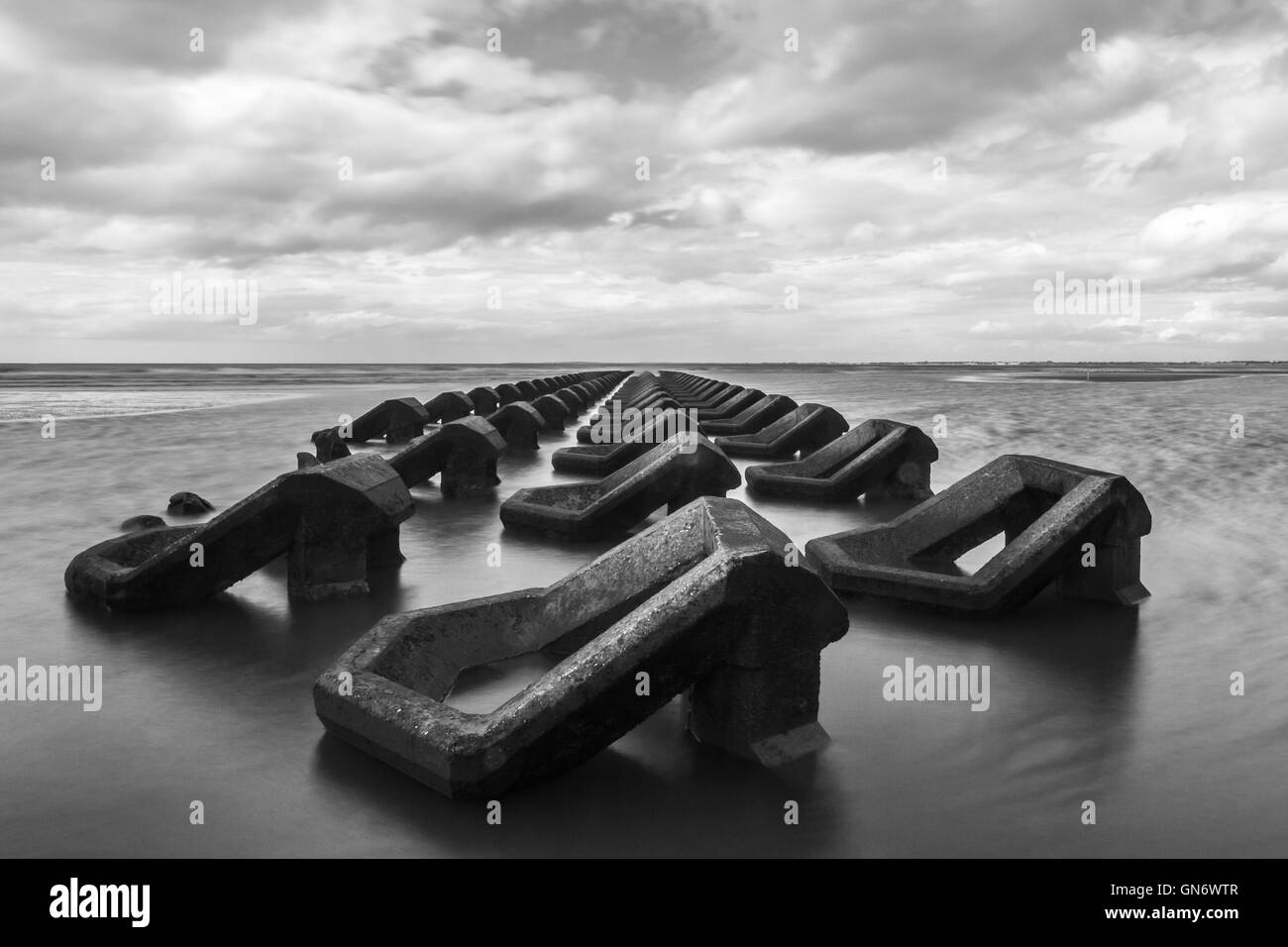 Black and white sea defenses at New Brighton, Wirral, England Stock ...