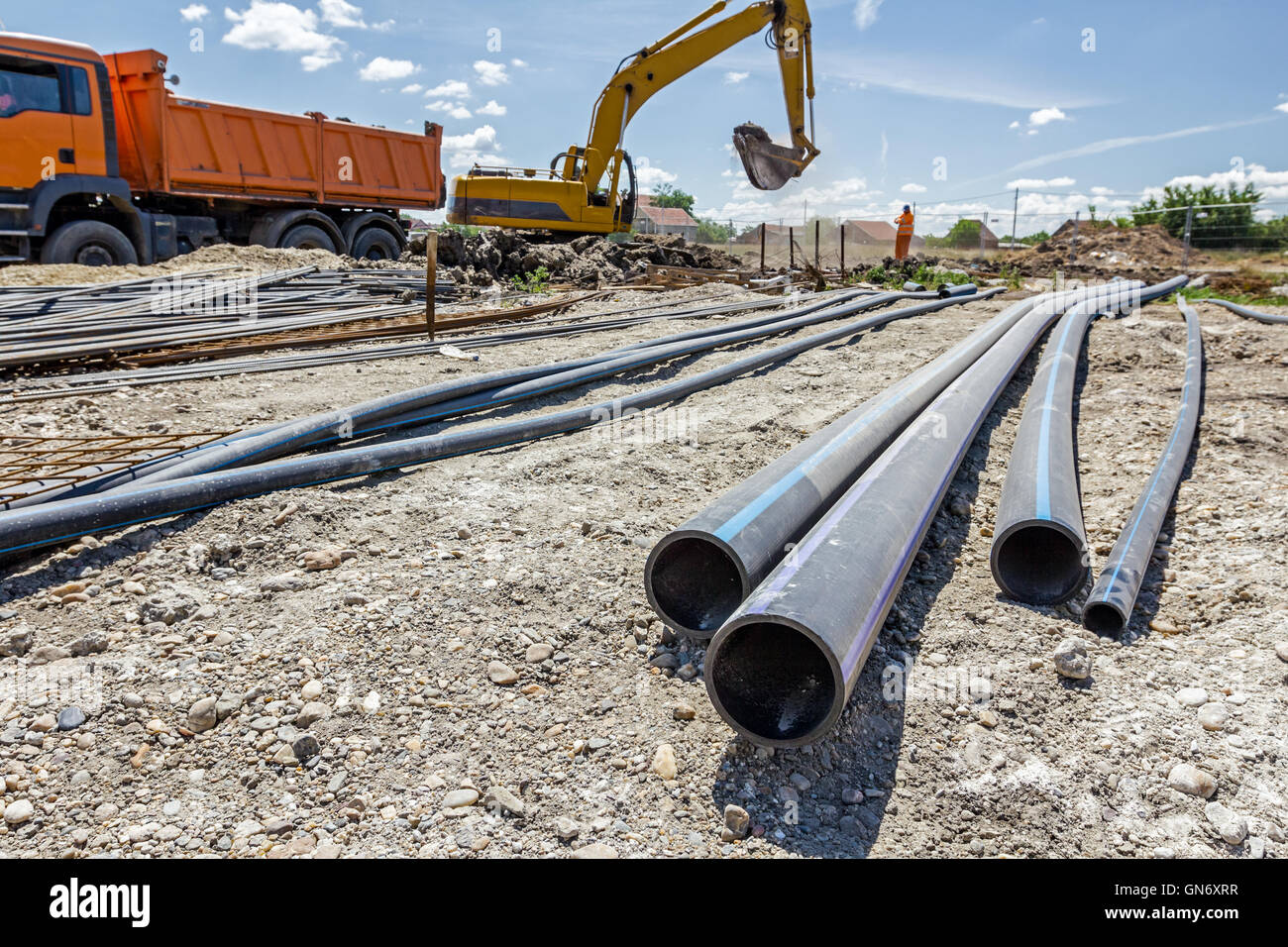 View on construction site with machinery, people at work. Landscape ...