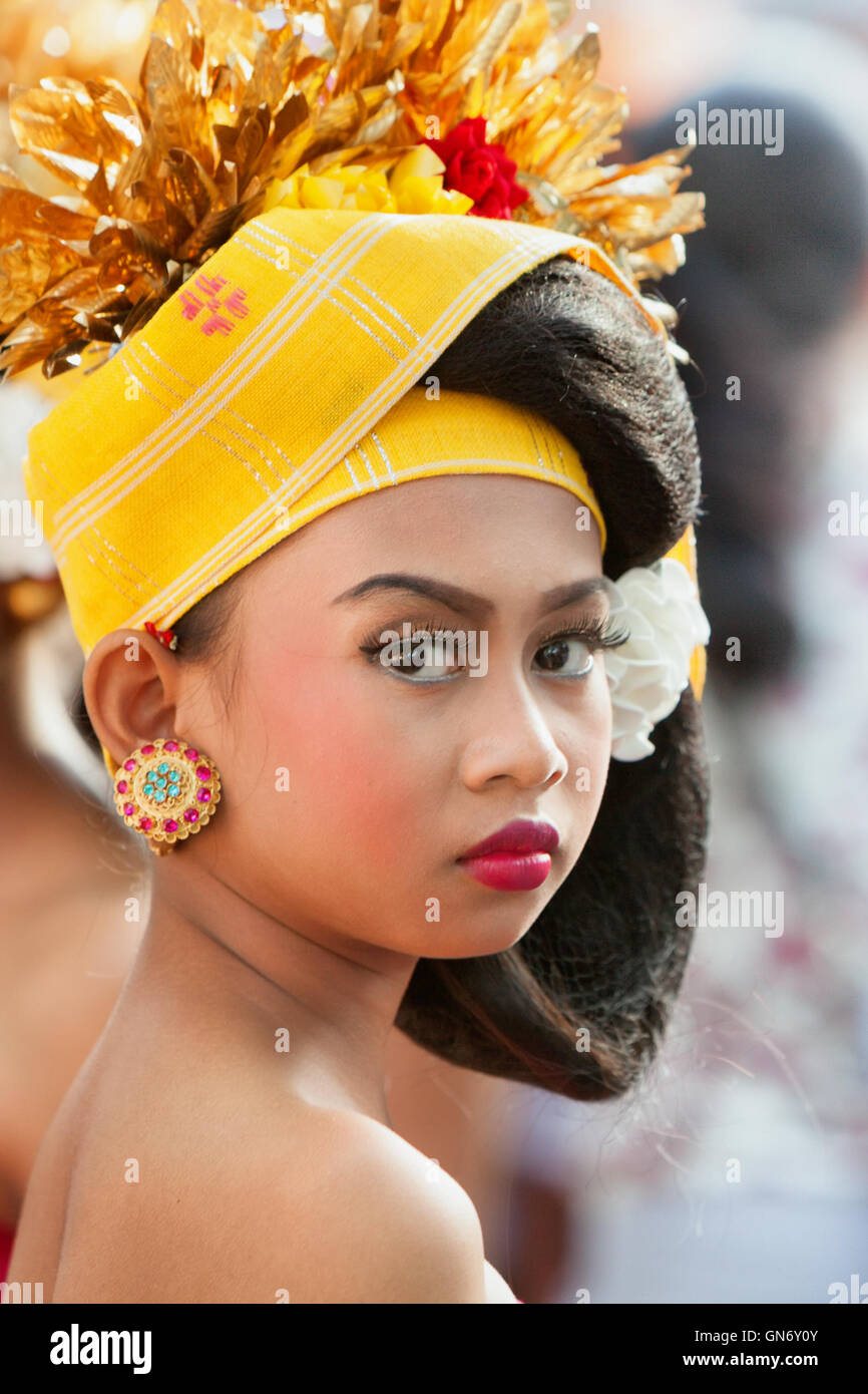 BALI, INDONESIA - JUNE 20: Face portrait of young dancer girl with jewellery dressed in ...