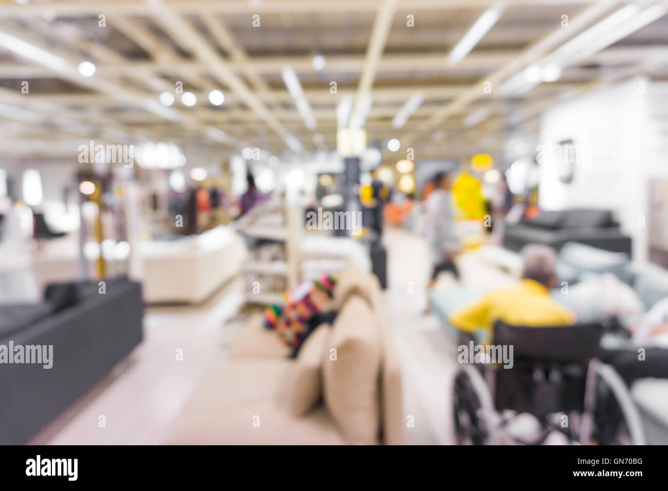 People shopping in department store. blur background Stock Photo - Alamy