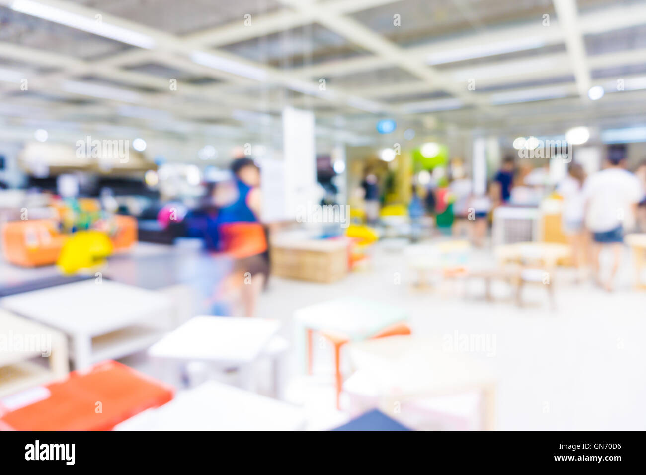 People shopping in department store. blur background Stock Photo - Alamy