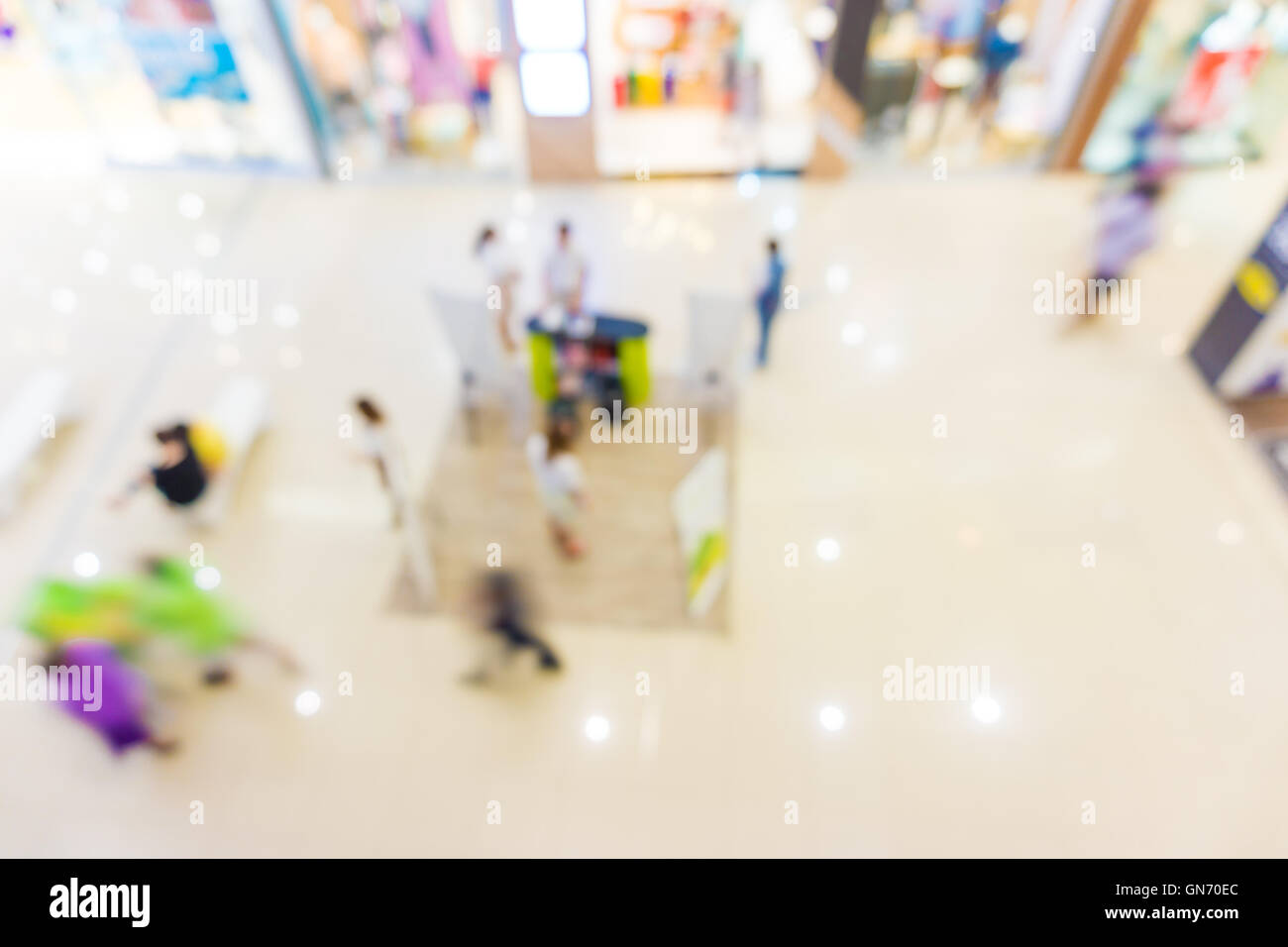 People shopping in department store. blur background Stock Photo - Alamy