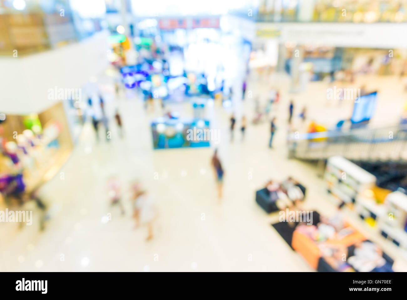People shopping in department store. blur background Stock Photo - Alamy