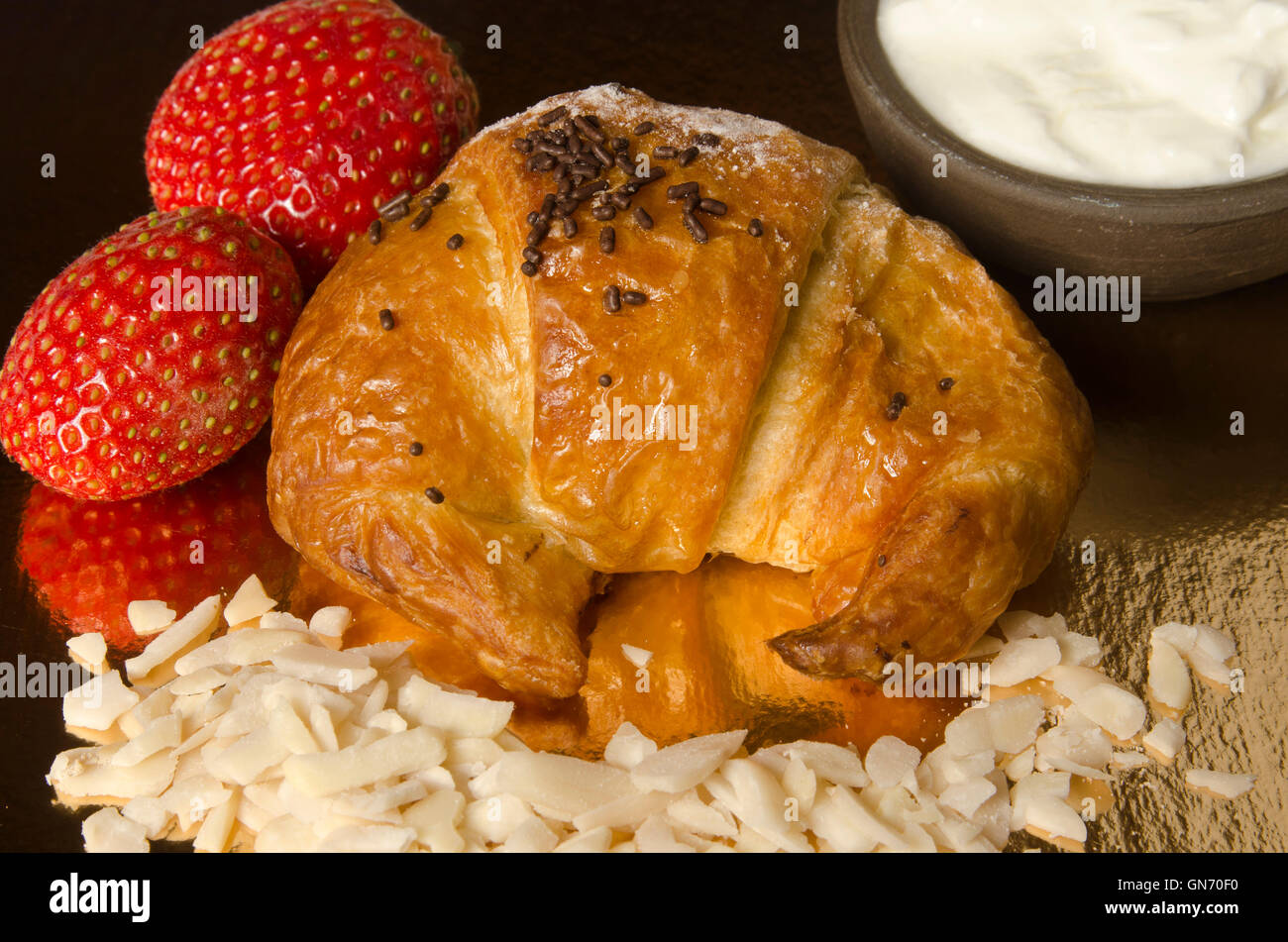 Chocolate filled croissant pastry snack Stock Photo - Alamy