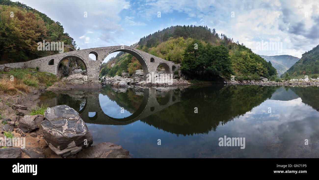 Panoramic picture on an arch bridge over the Arda River (BG) early in ...