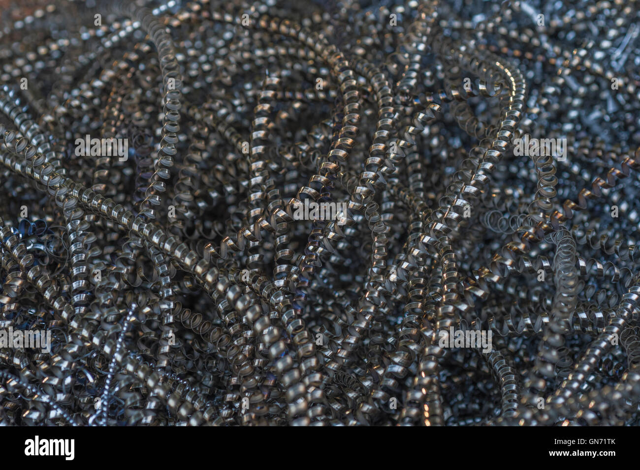 Close shot of metal turnings / industrial swarf from CNC machining ...