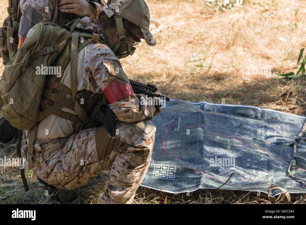 soldier in uniform with weapon on a mission Stock Photo - Alamy