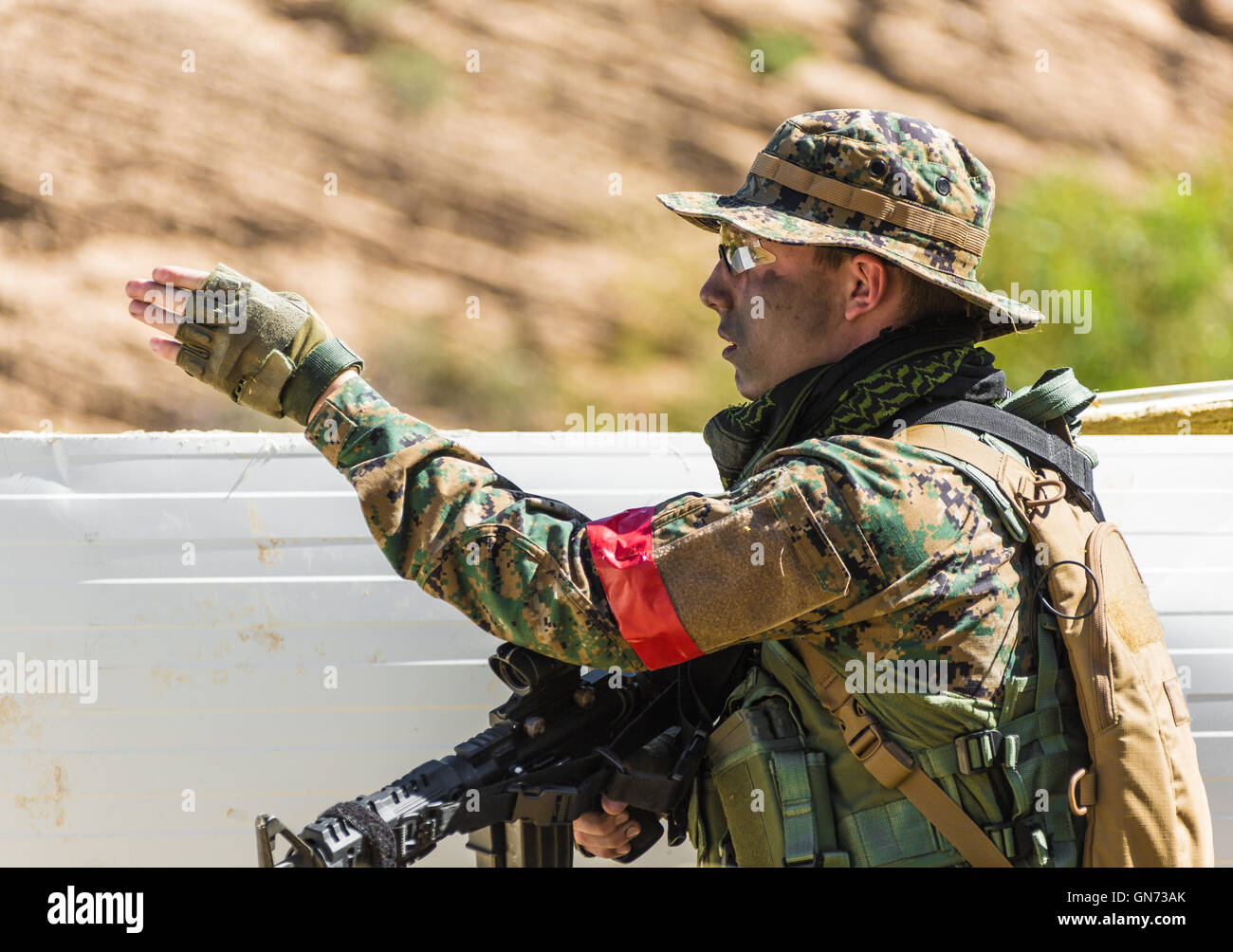 soldier in uniform with weapon on a mission Stock Photo - Alamy