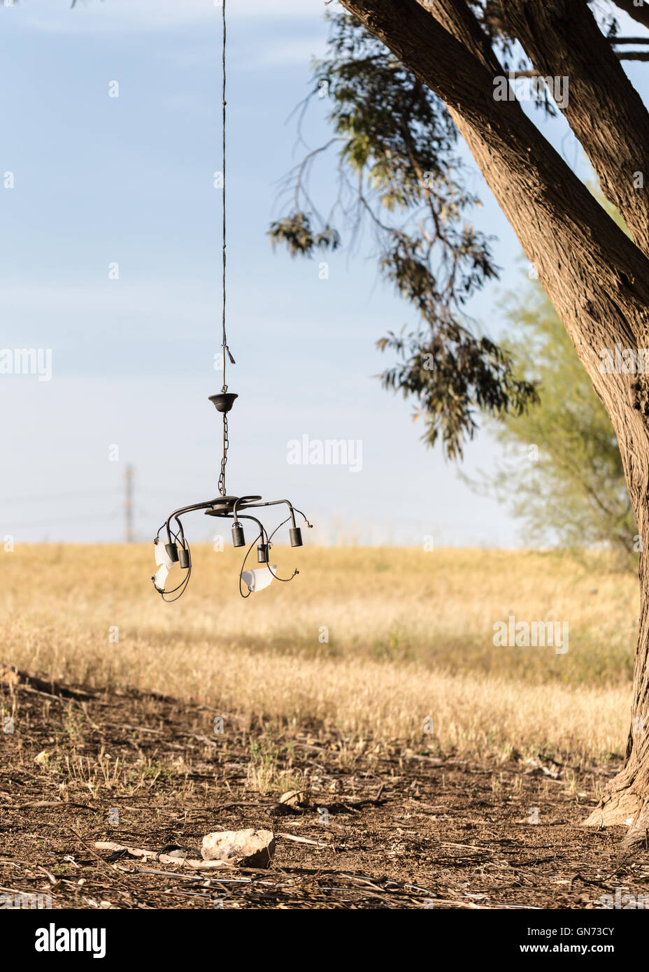 old the broken chandelier hanging on outdoors Stock Photo - Alamy