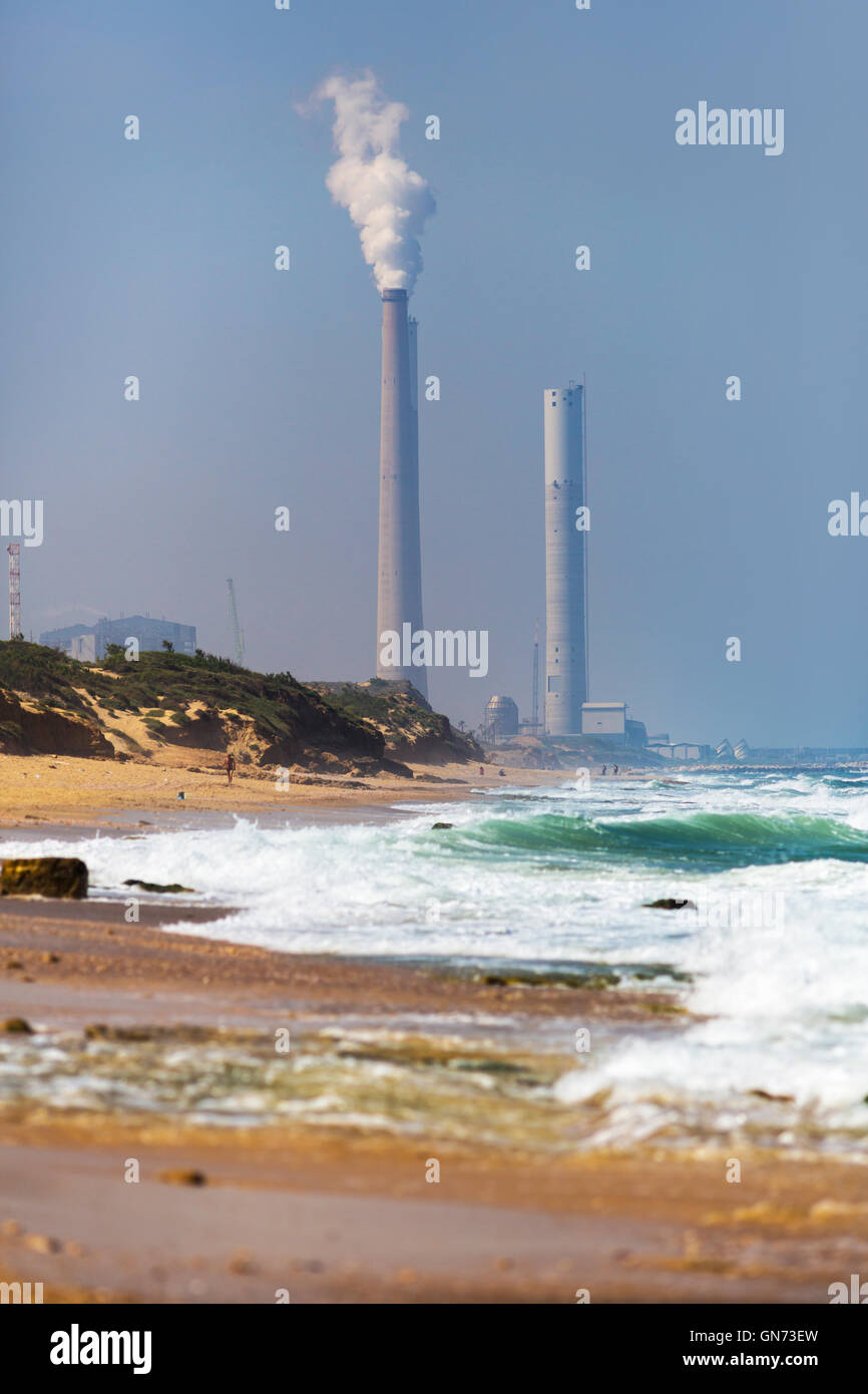 smokestack pipe factory on the shore of blue sea Stock Photo - Alamy