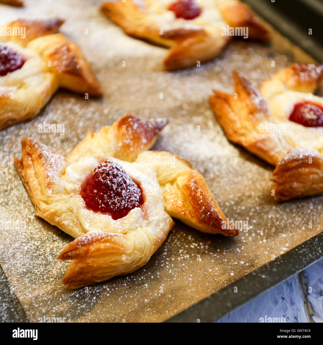 Homemade danish puff pastry pinwheels with vanilla pastry cream and ...
