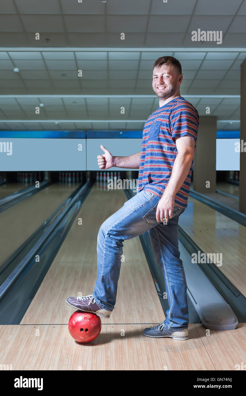 Happy man in bowling Stock Photo - Alamy