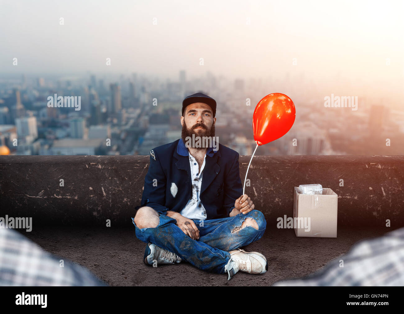 Vagrant with ballon Stock Photo - Alamy