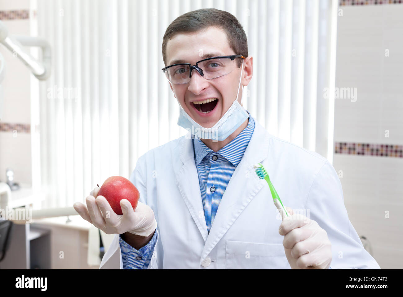 Young dentist portrait Stock Photo - Alamy