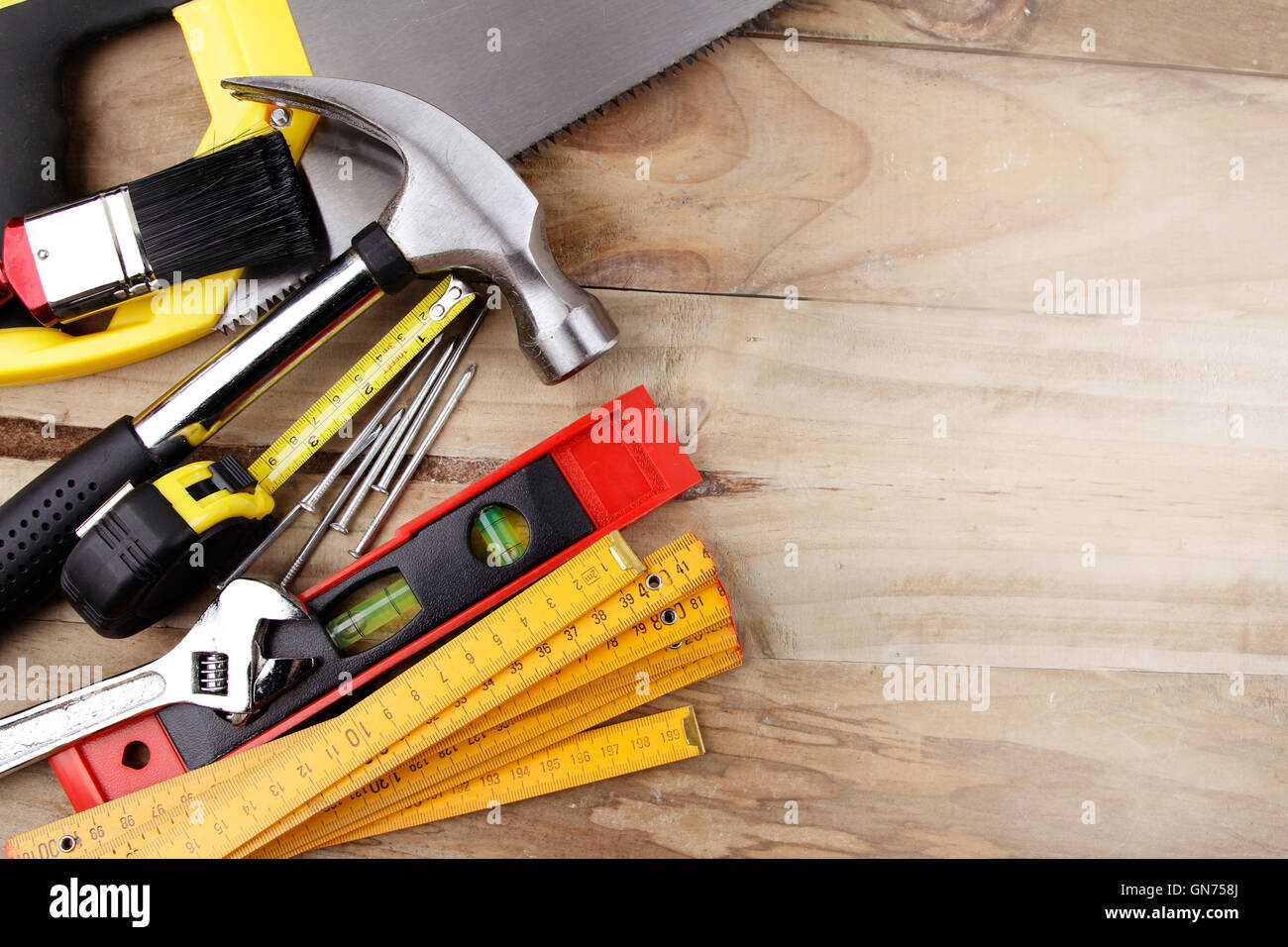 Assortment of tools on wood Stock Photo - Alamy