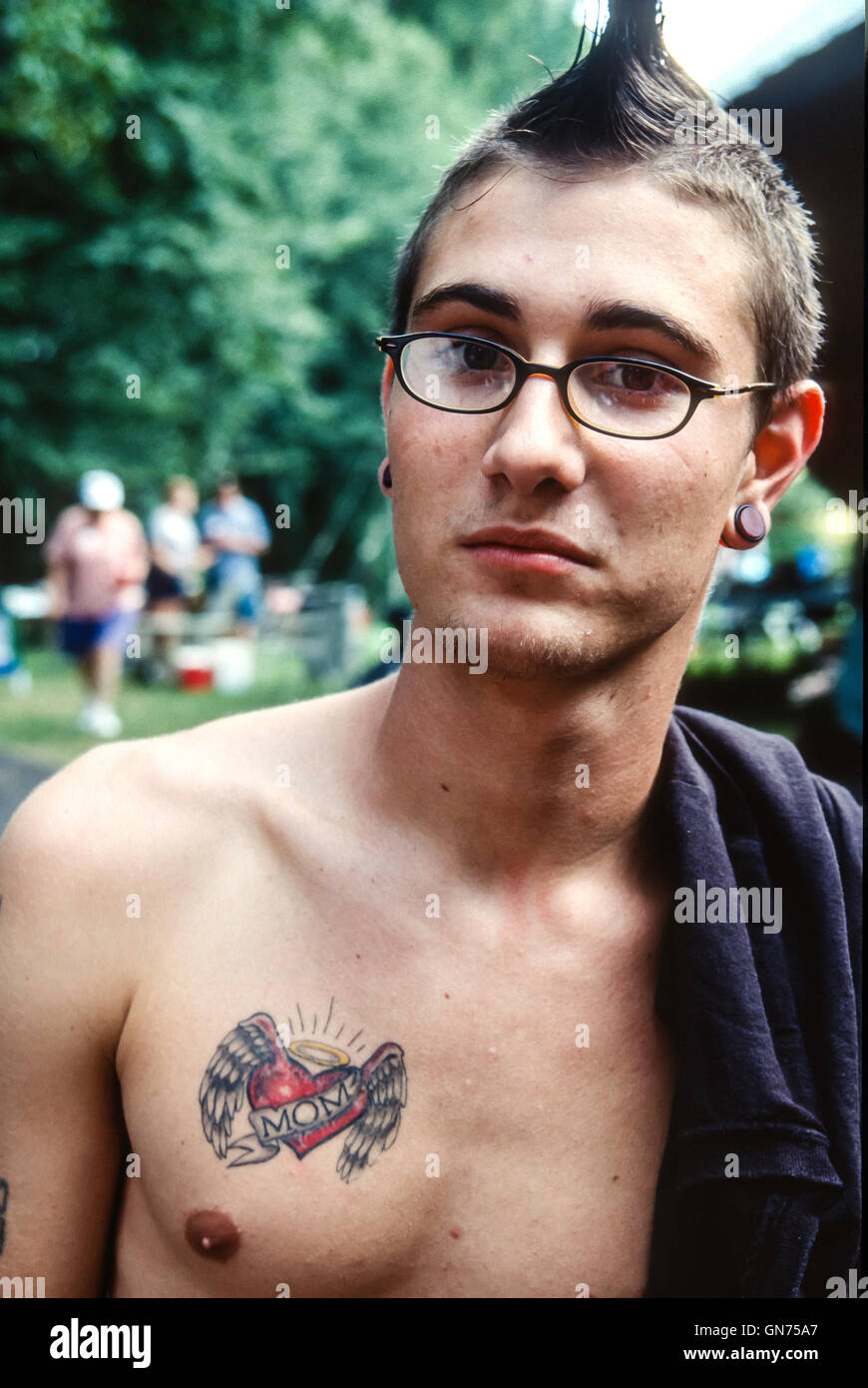 Young boy with tattoos Stock Photo - Alamy