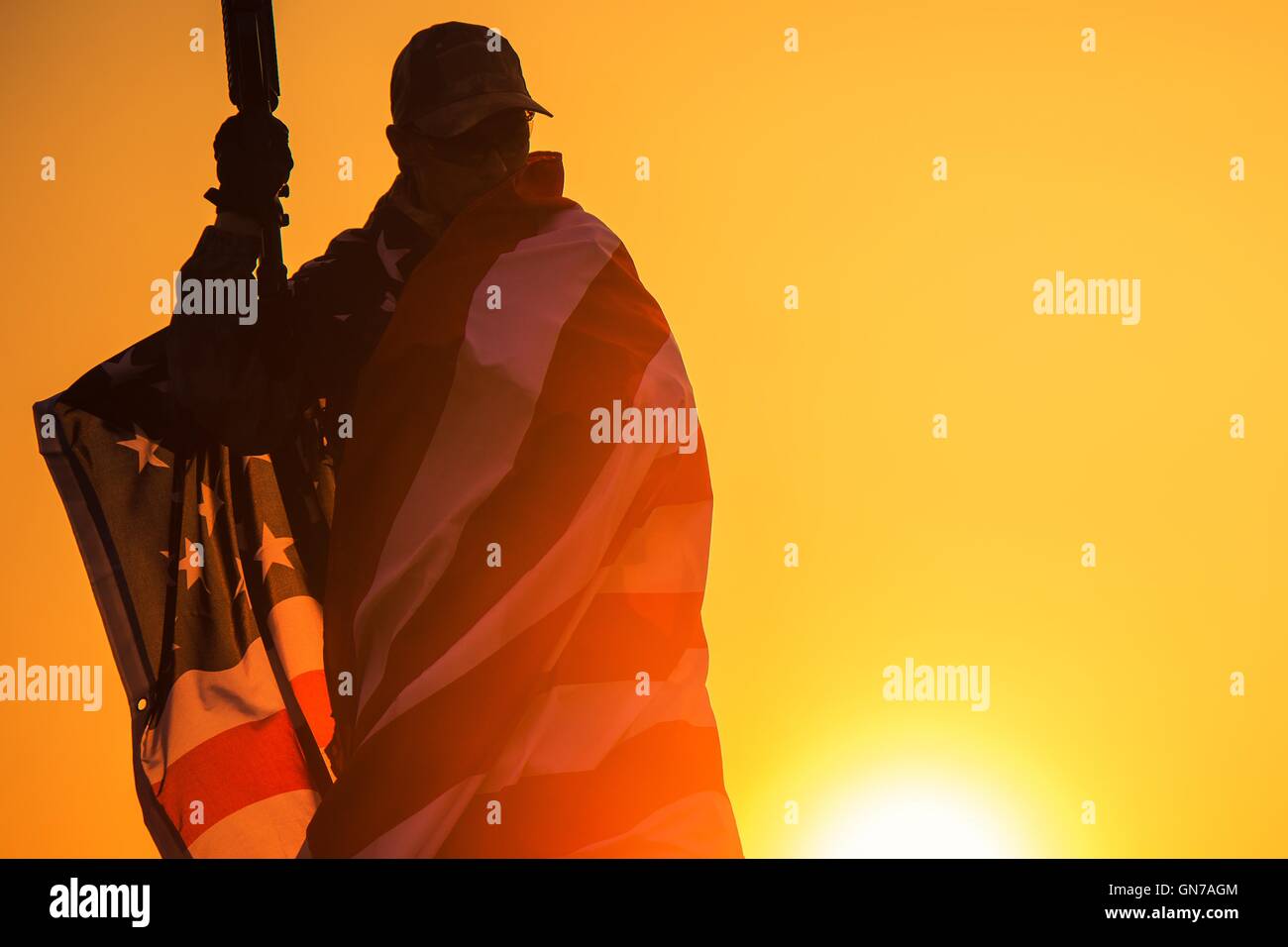 True Patriot Soldier. American Soldier with Assault Rifle Covered by ...