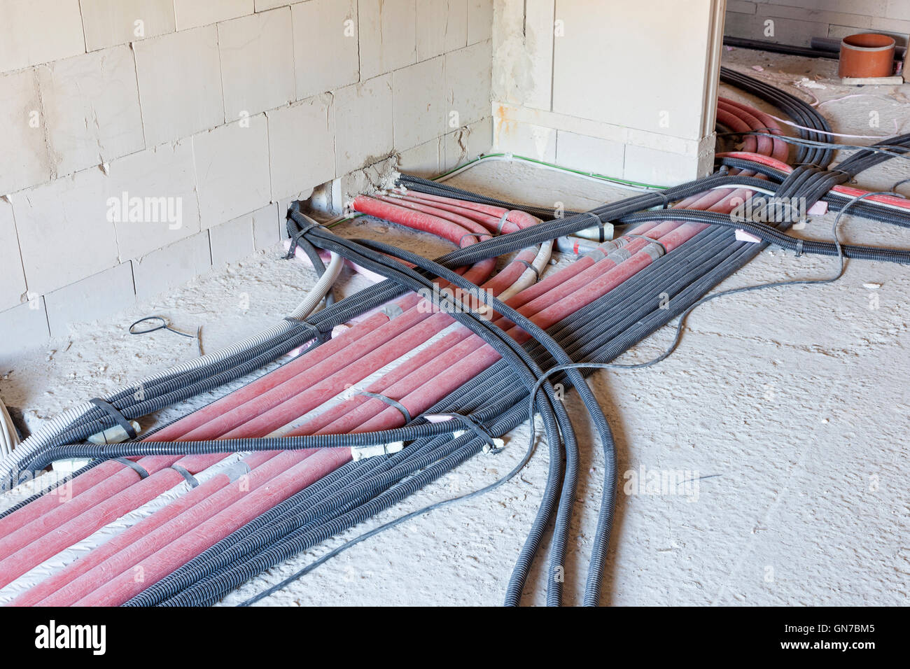 Cables and pipes in a new house Stock Photo - Alamy