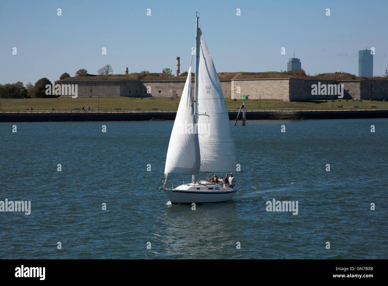 Yacht sailing by Fort Independence and Boston Waterfront from Boston ...