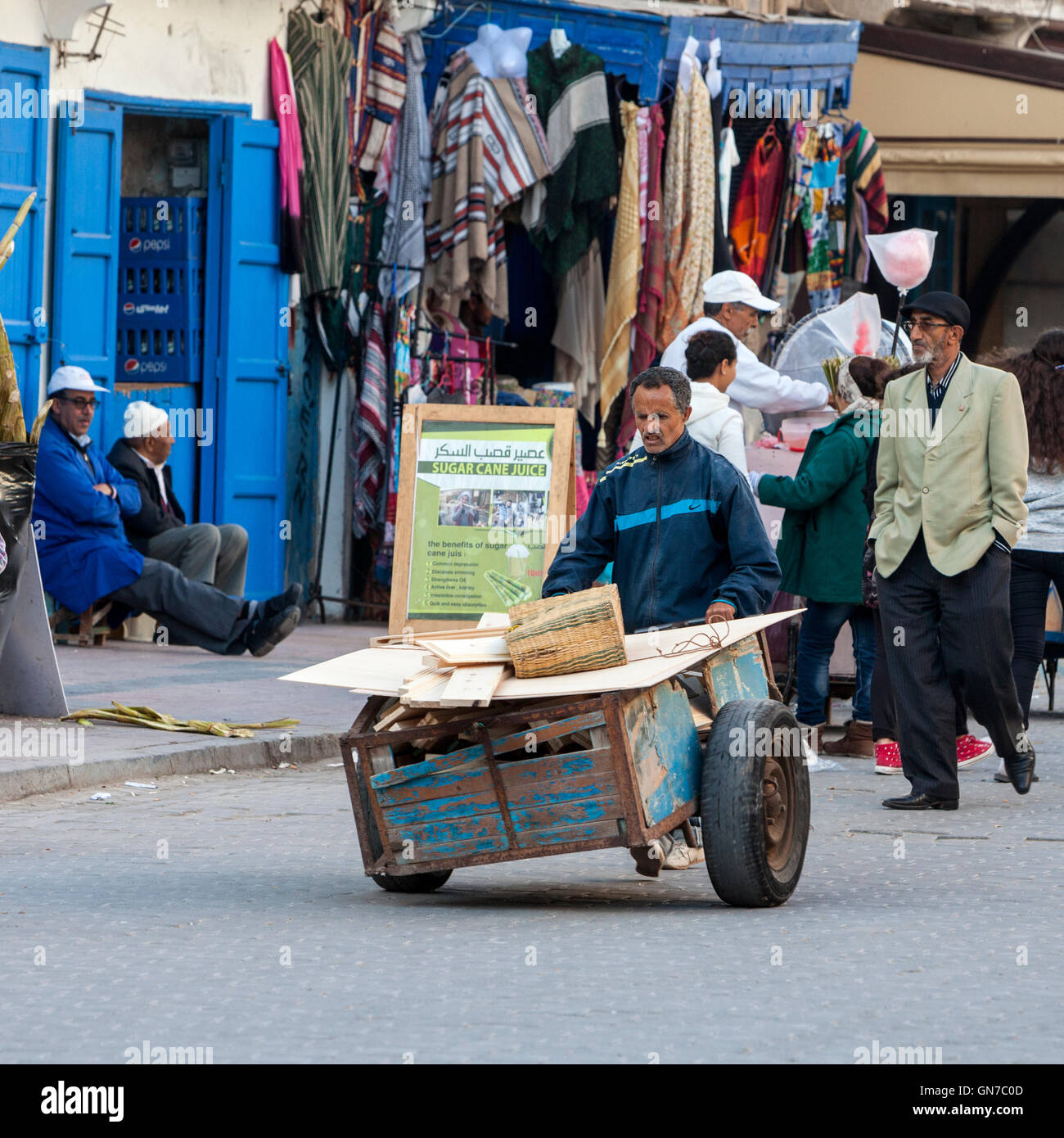 Pushing cart hi-res stock photography and images - Alamy