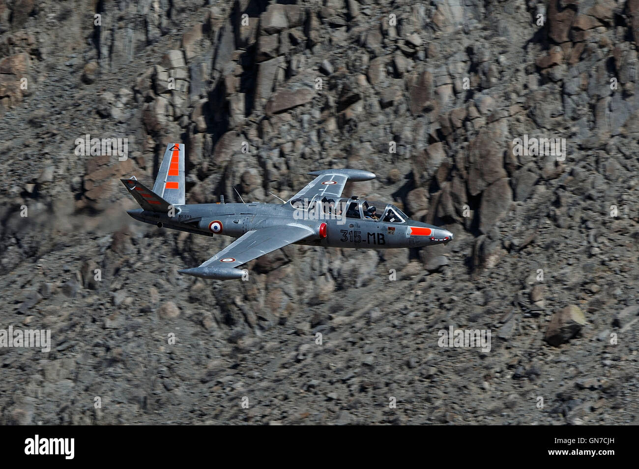 A Fouga CM-170 Magister (registration N315MB) flies low level through ...