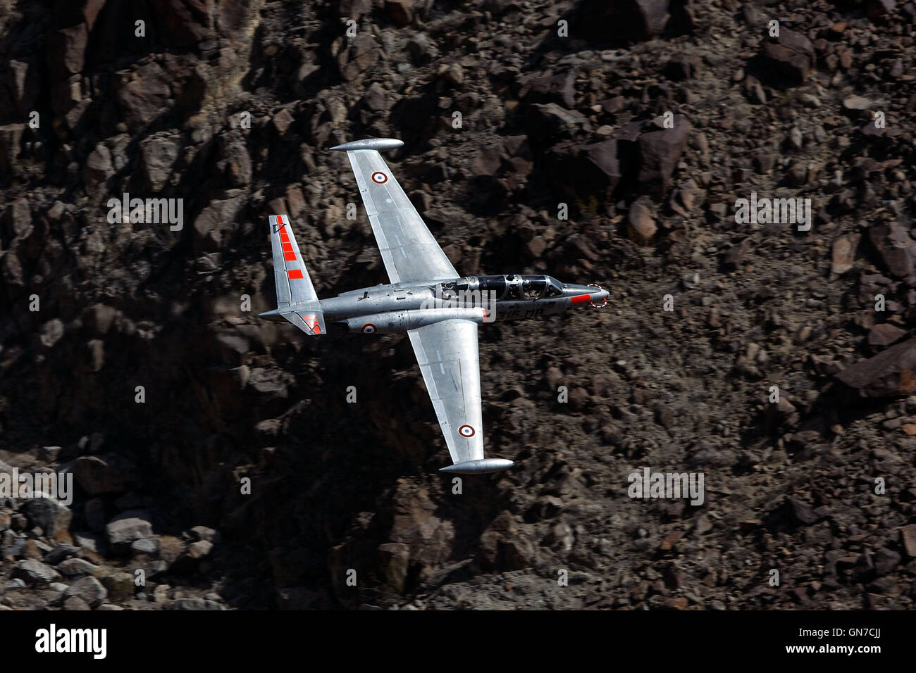A Fouga CM-170 Magister (registration N315MB) flies low level through ...