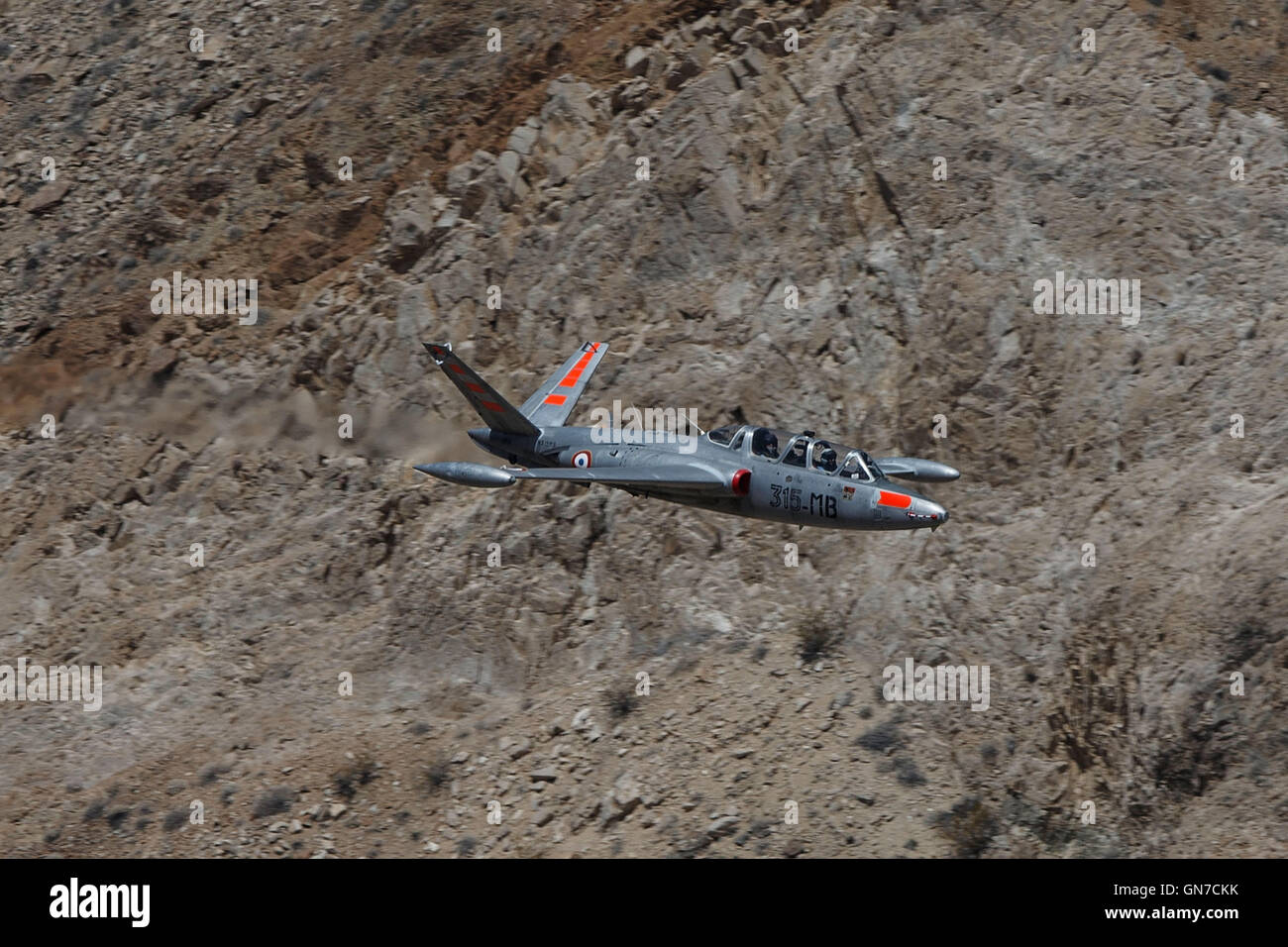 A Fouga CM-170 Magister (registration N315MB) flies low level through ...